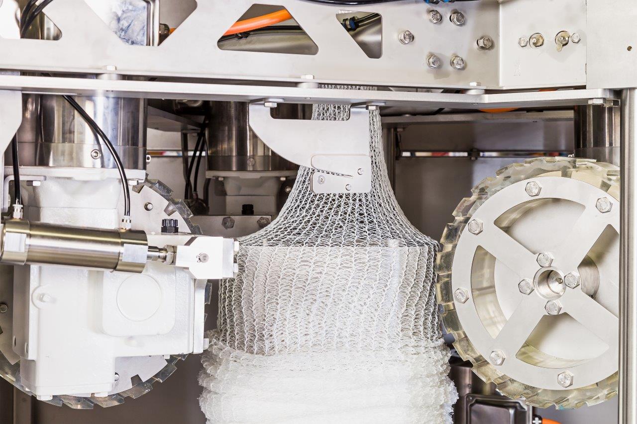 TIPPER TIE’S RFDW2: take the challenge out of whole ham netting - The ...